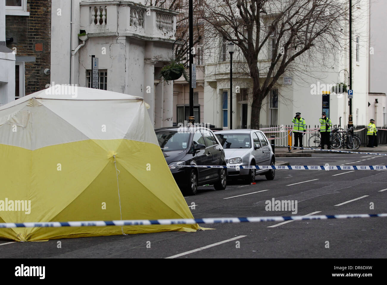 Police forensic in a cordon at a crime scene in Lupus Street Pimlico ...
