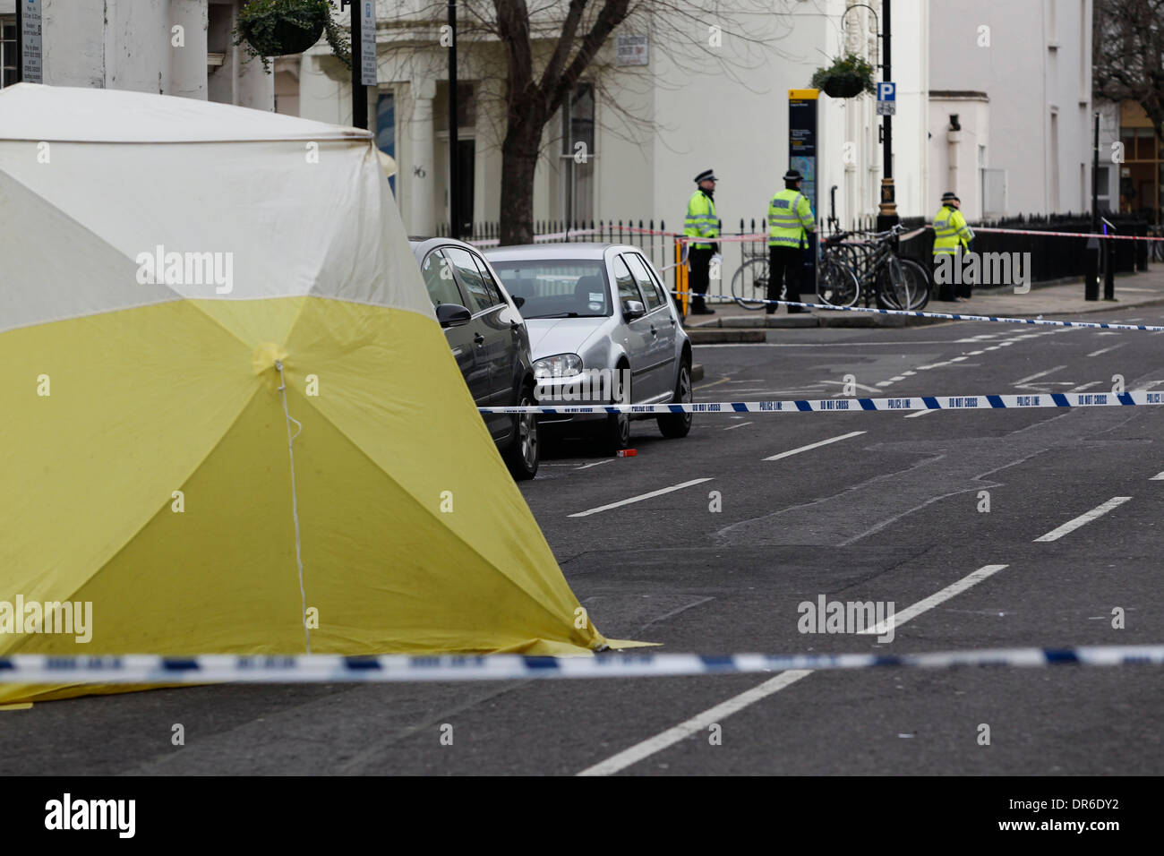 Police forensic in a cordon at a crime scene in Lupus Street Pimlico ...