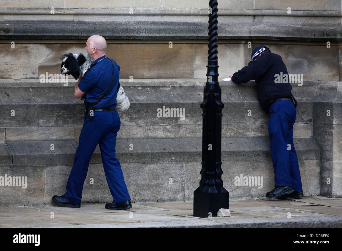 Police officers conduct a security sweep at Parliament ahead of the ...