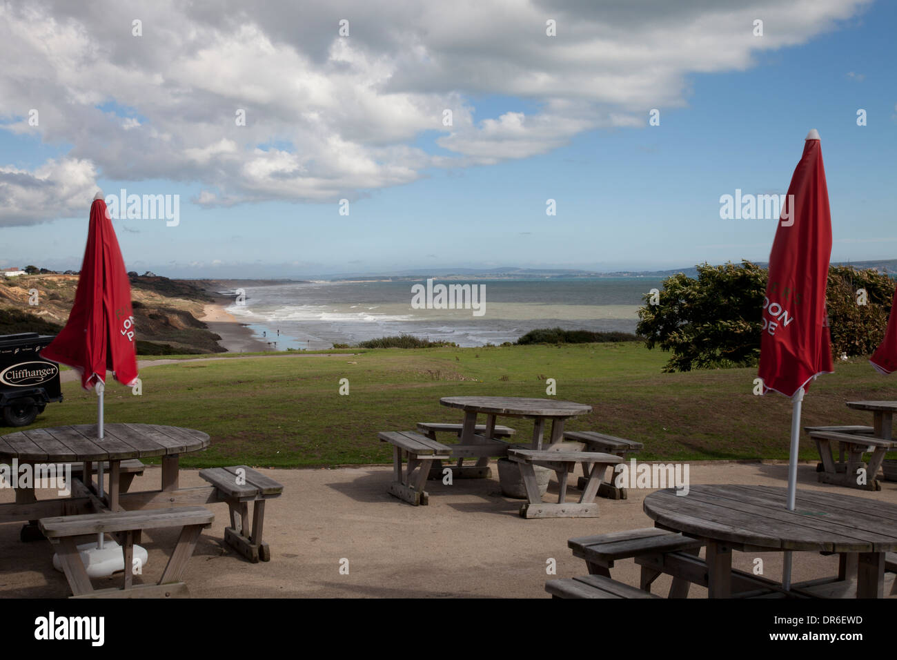 Tables and umbrellas at the Cliffhanger Café, Highcliffe-on-sea, dorset ...
