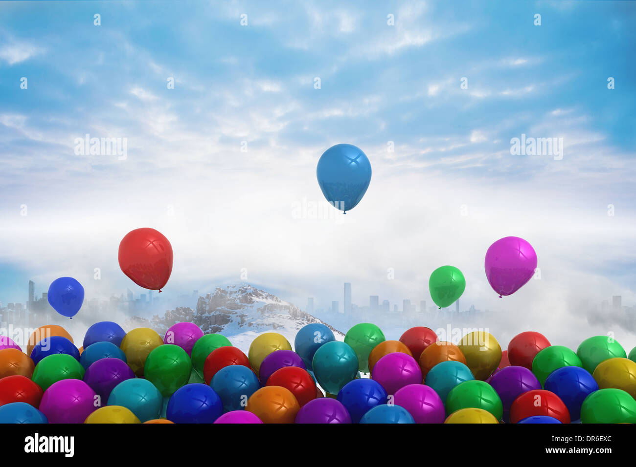 Many colourful balloons above snow Stock Photo - Alamy