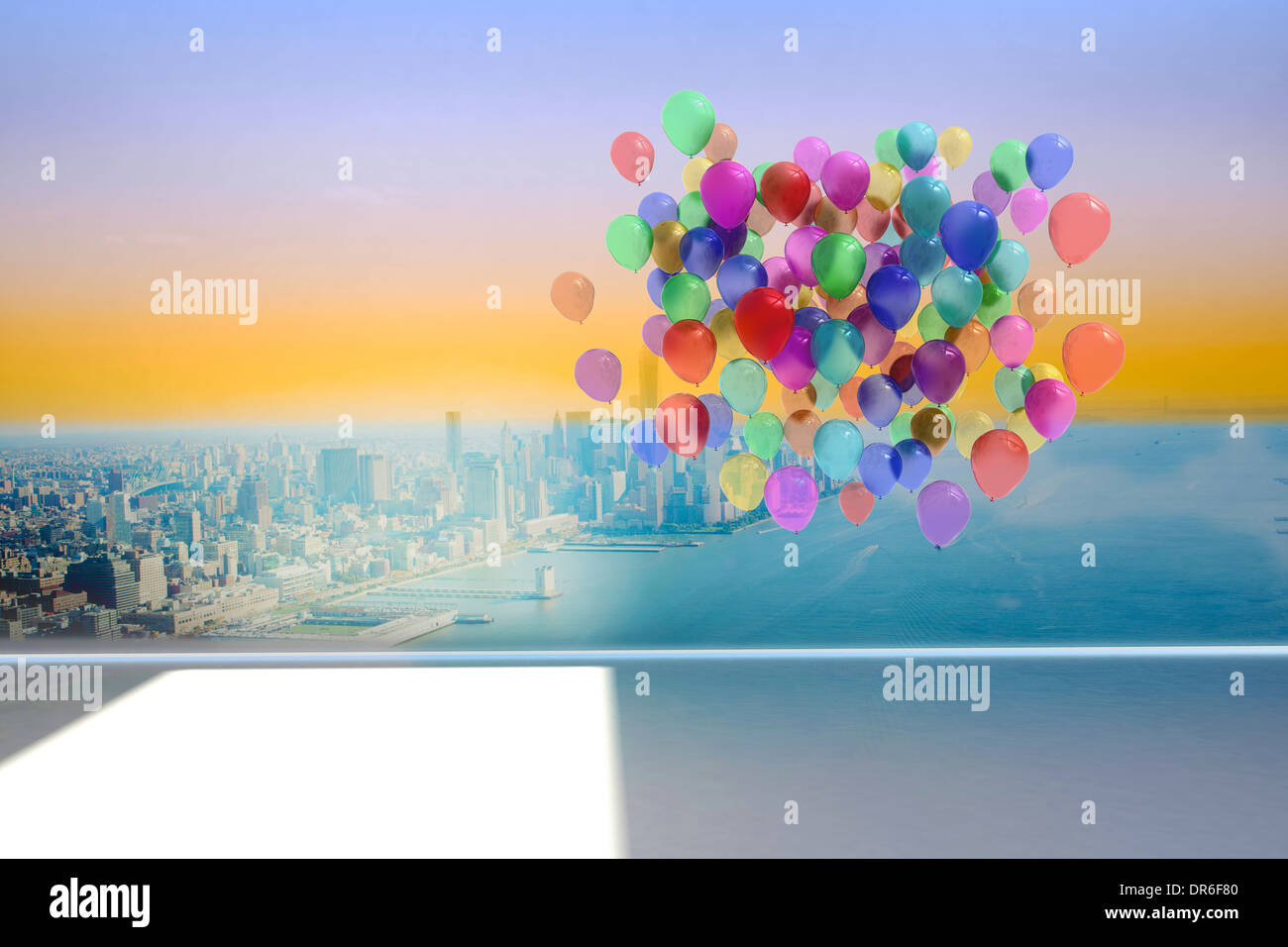Many colourful balloons in room with city scene Stock Photo - Alamy