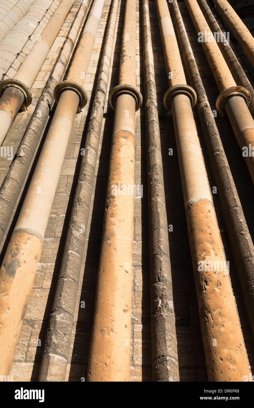 Decorative stonework on the side of Peterborough Cathedral UK. Columns ...