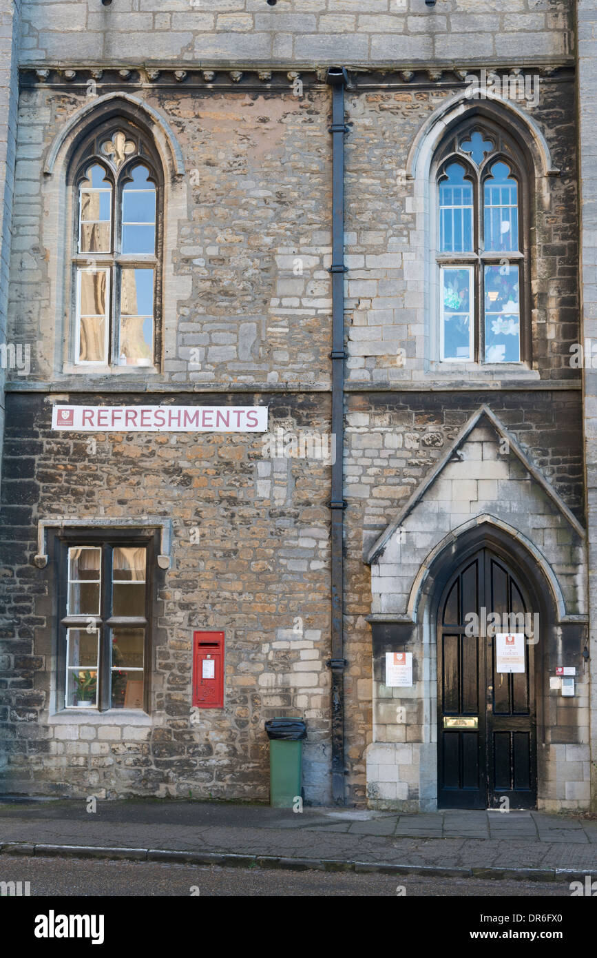 The refreshments shop or café in old buildings in the courtyard at ...