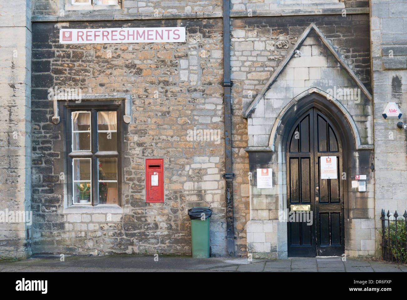 The refreshments shop or café in old buildings in the courtyard at ...