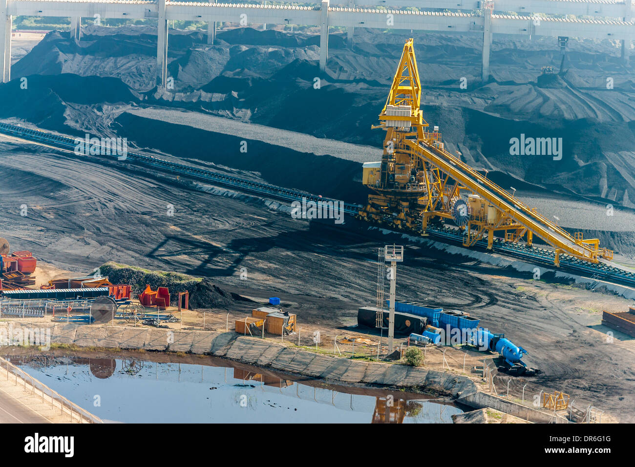 Hadera, Israel. Coal storage area in a power plant, surrounded by ...