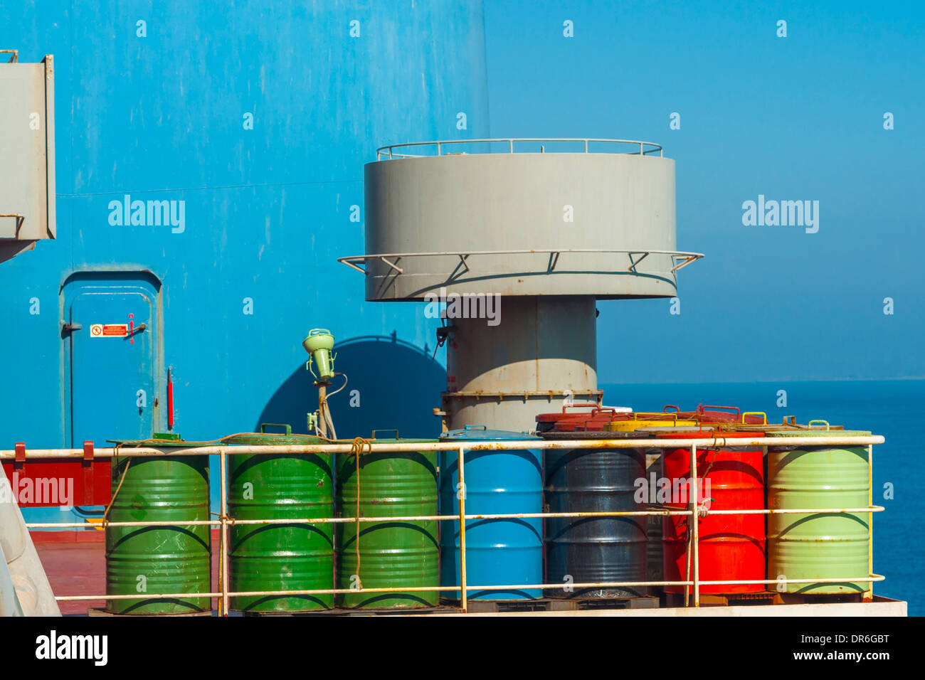 Colorful barrels on a ship deck Stock Photo - Alamy