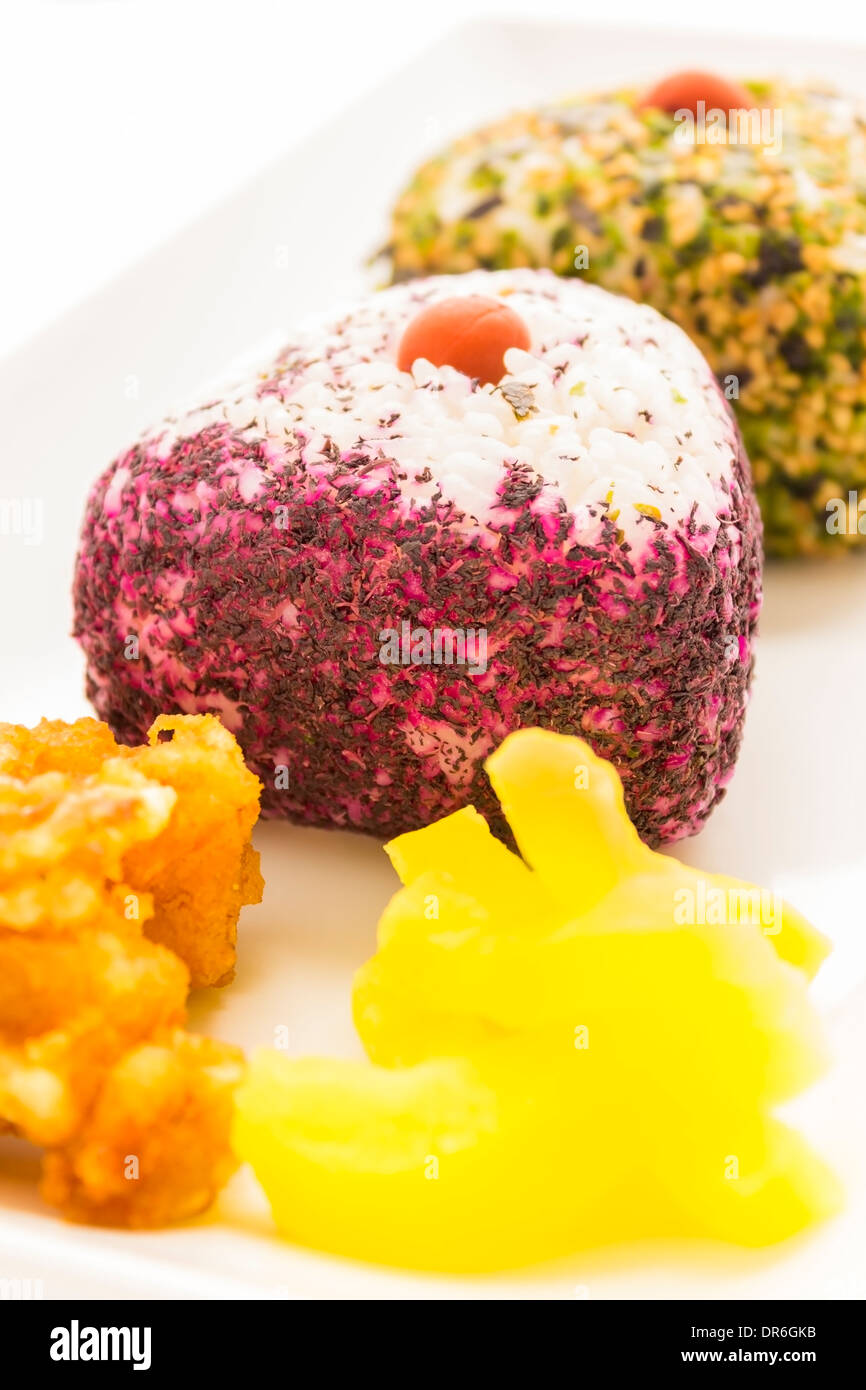 Common Hawaiian food, ume rice musubi, one with yukari and one with ...