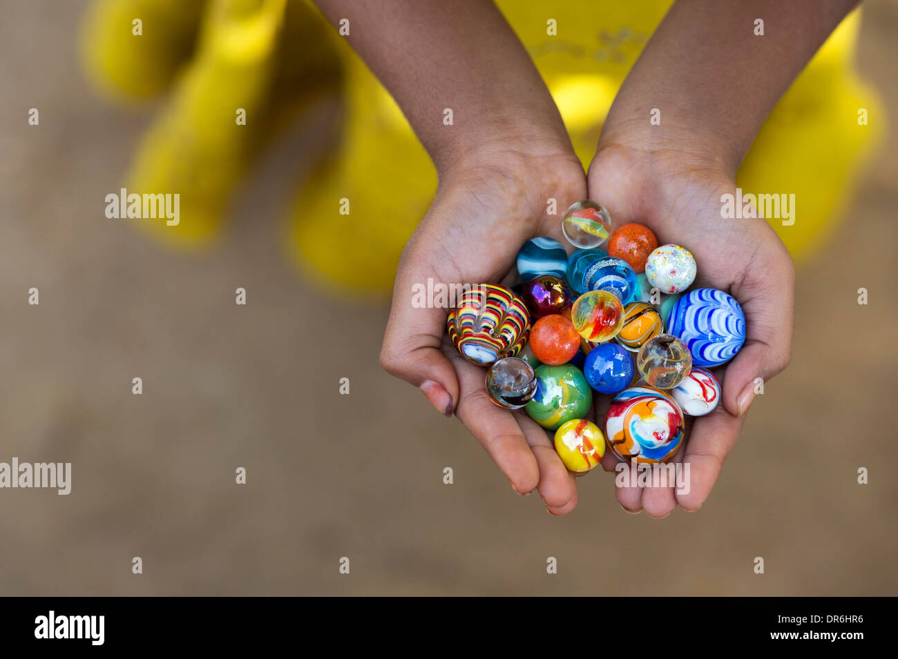 Children playing marbles hi-res stock photography and images - Alamy