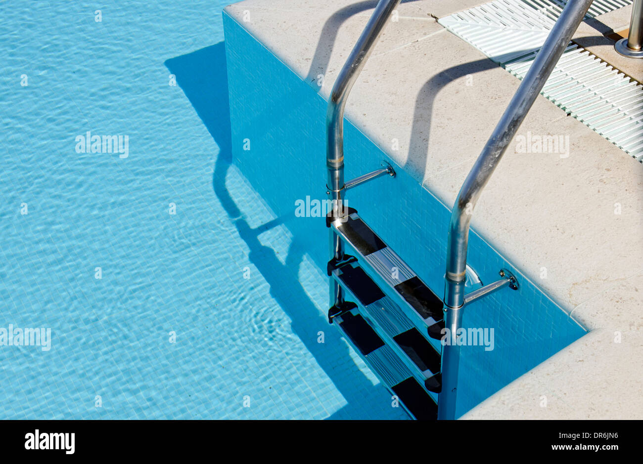 Stairs into a swimming pool Stock Photo - Alamy