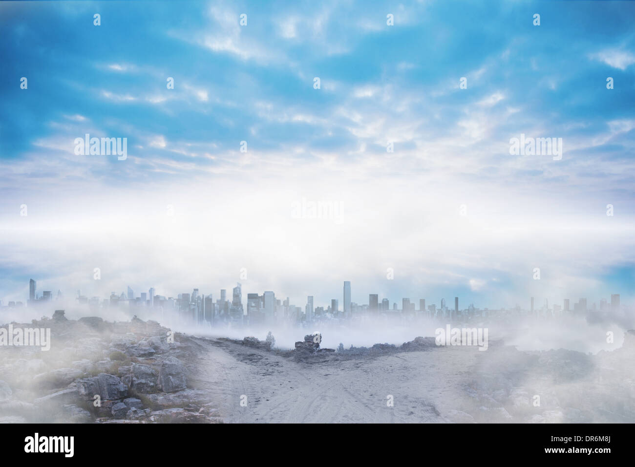 Dusty path leading to city under the clouds Stock Photo - Alamy