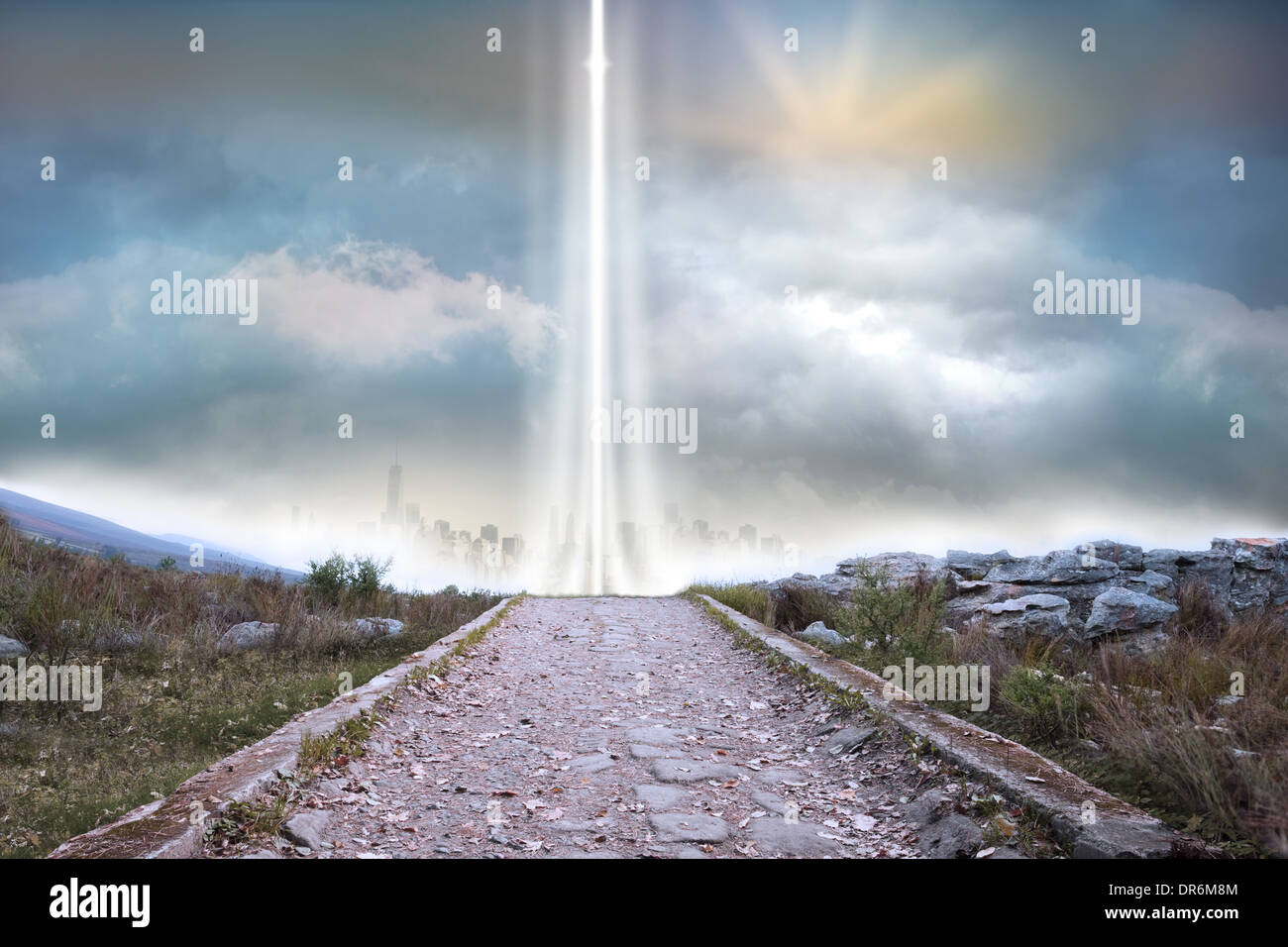 Rocky path leading to light beam Stock Photo - Alamy