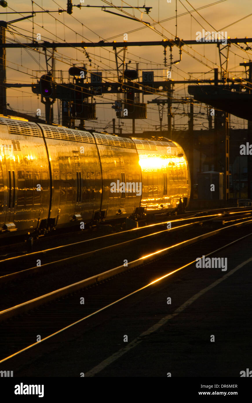Sunlight reflected on train Stock Photo - Alamy