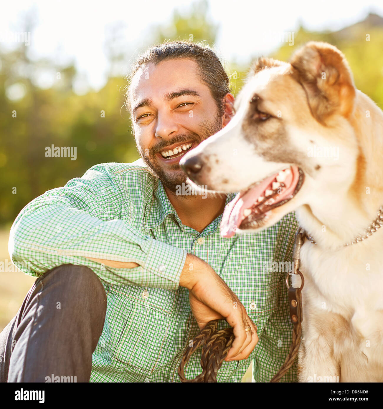 Cute guy with puppy hi-res stock photography and images - Alamy