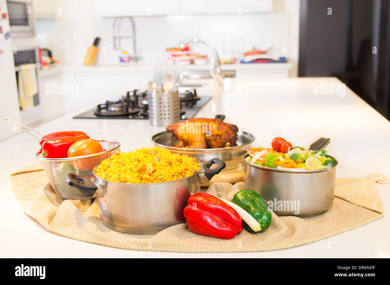 Cooking time, meal in kitchen Stock Photo - Alamy
