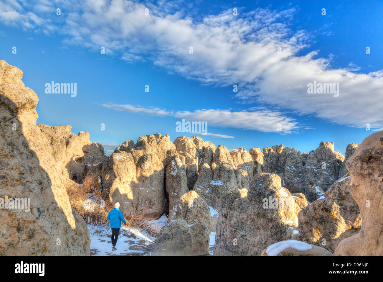 a hiker in Natural Fort sculpted from sandstone (Oligocenne White River ...