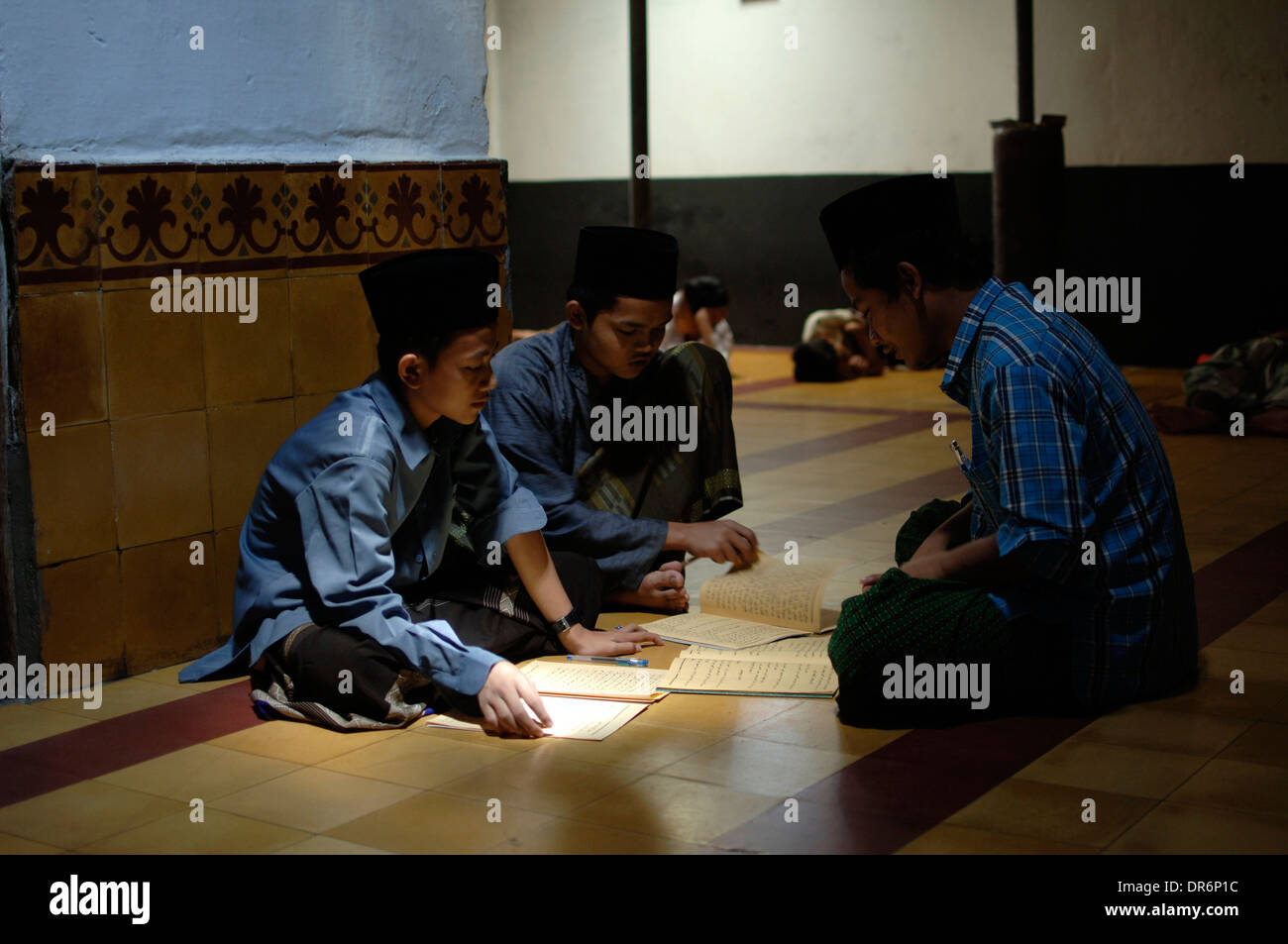 A number of students studying Arabic in the islamic boarding school ...