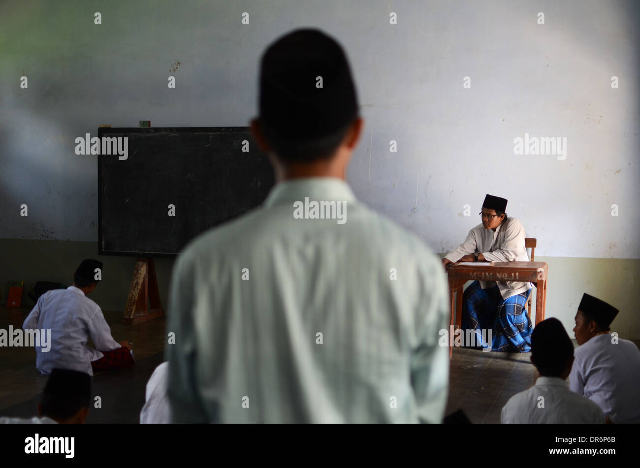 A number of students take the exam in the islamic boarding school ...