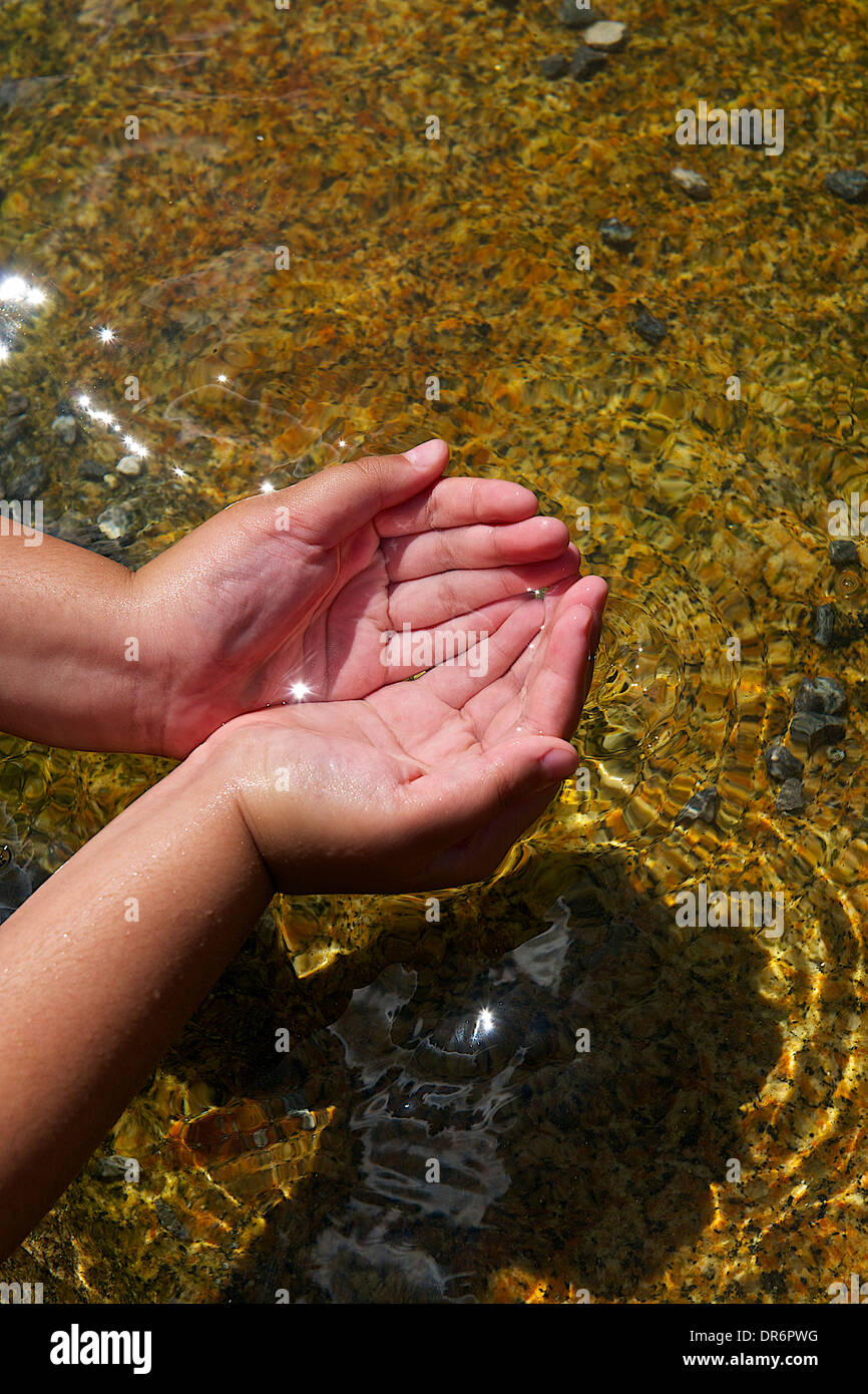 Hands scooping water hi-res stock photography and images - Alamy