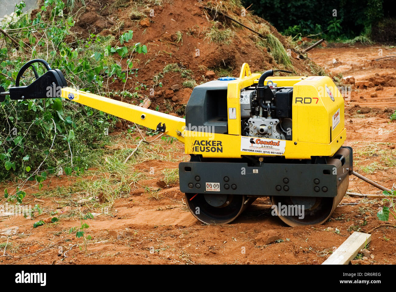Construction site compactor ready to compact the land before starting ...