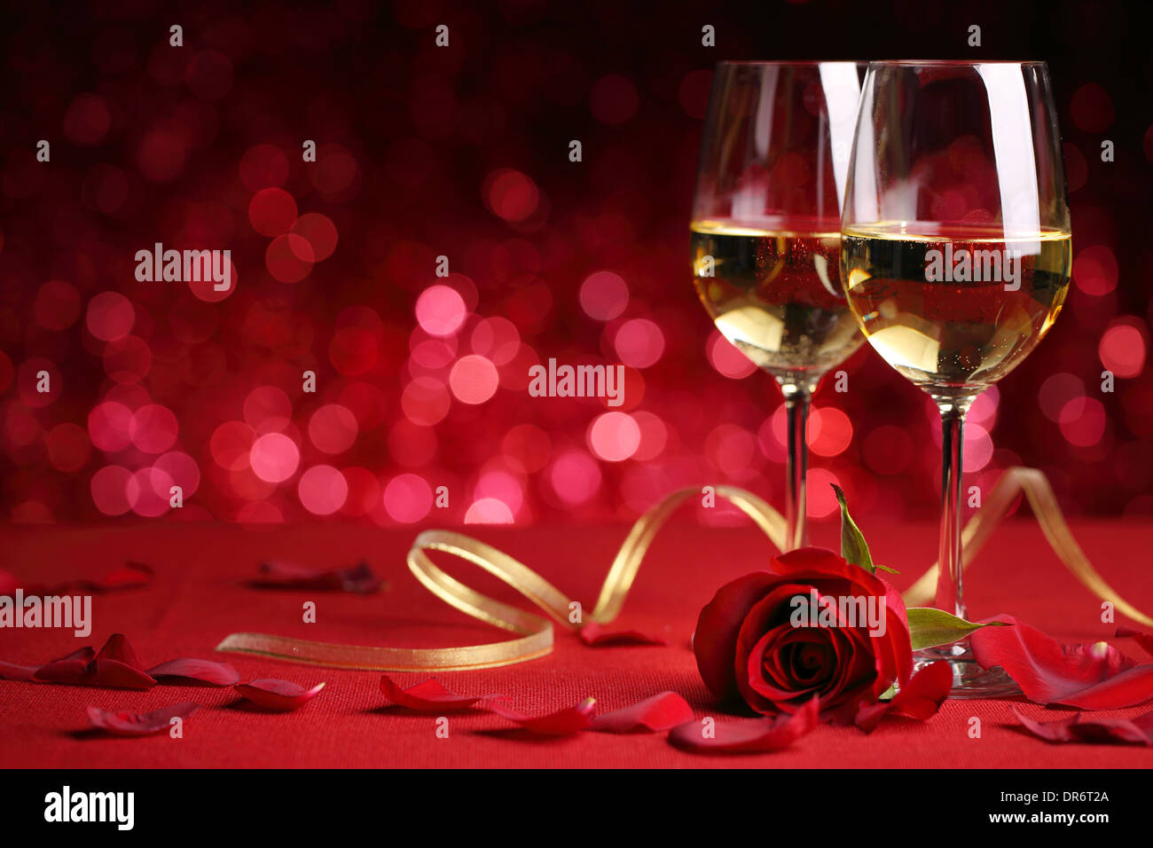 Celebration with wine and rose Stock Photo - Alamy