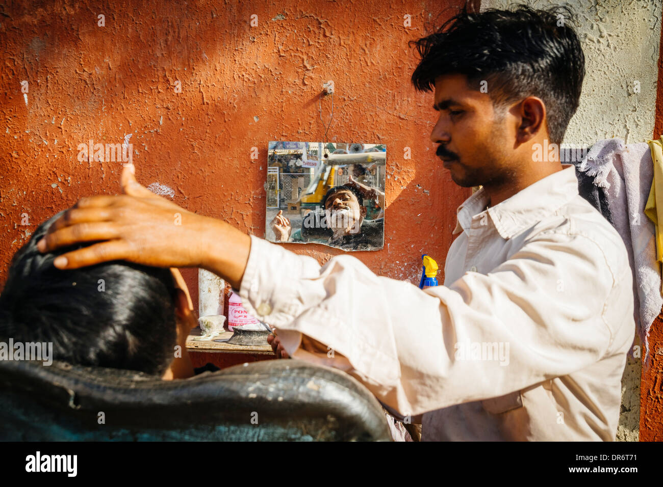 Street barber shaving customer hi-res stock photography and images - Alamy