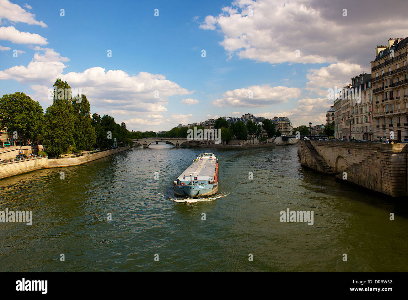 Barge passing through River Seine, Paris, France Stock Photo - Alamy