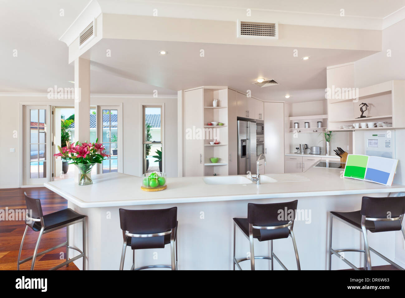 modern minimal white kitchen in australian home Stock Photo - Alamy