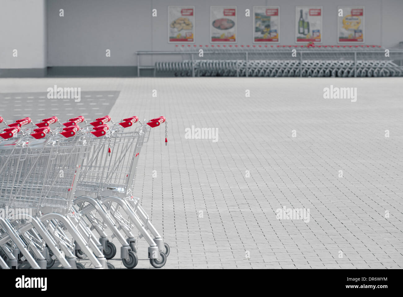 Shopping carts at parking place of a supermarket Stock Photo - Alamy