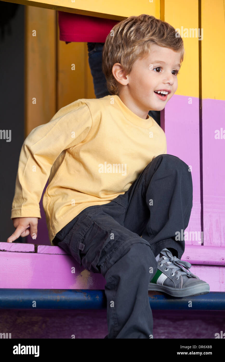 Little Boy Playing At Playhouse Stock Photo - Alamy