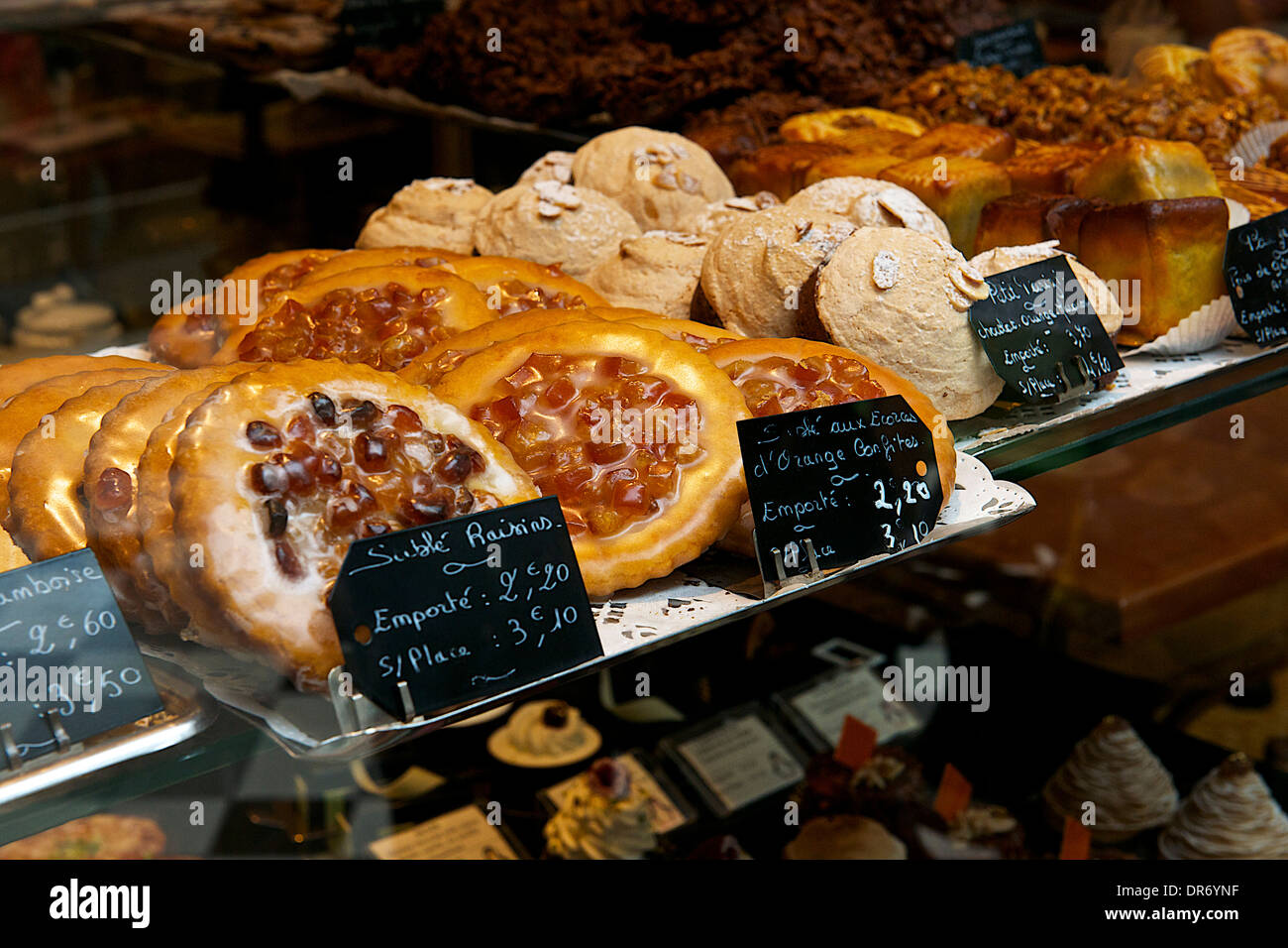 Pastries displayed at bakery Stock Photo - Alamy