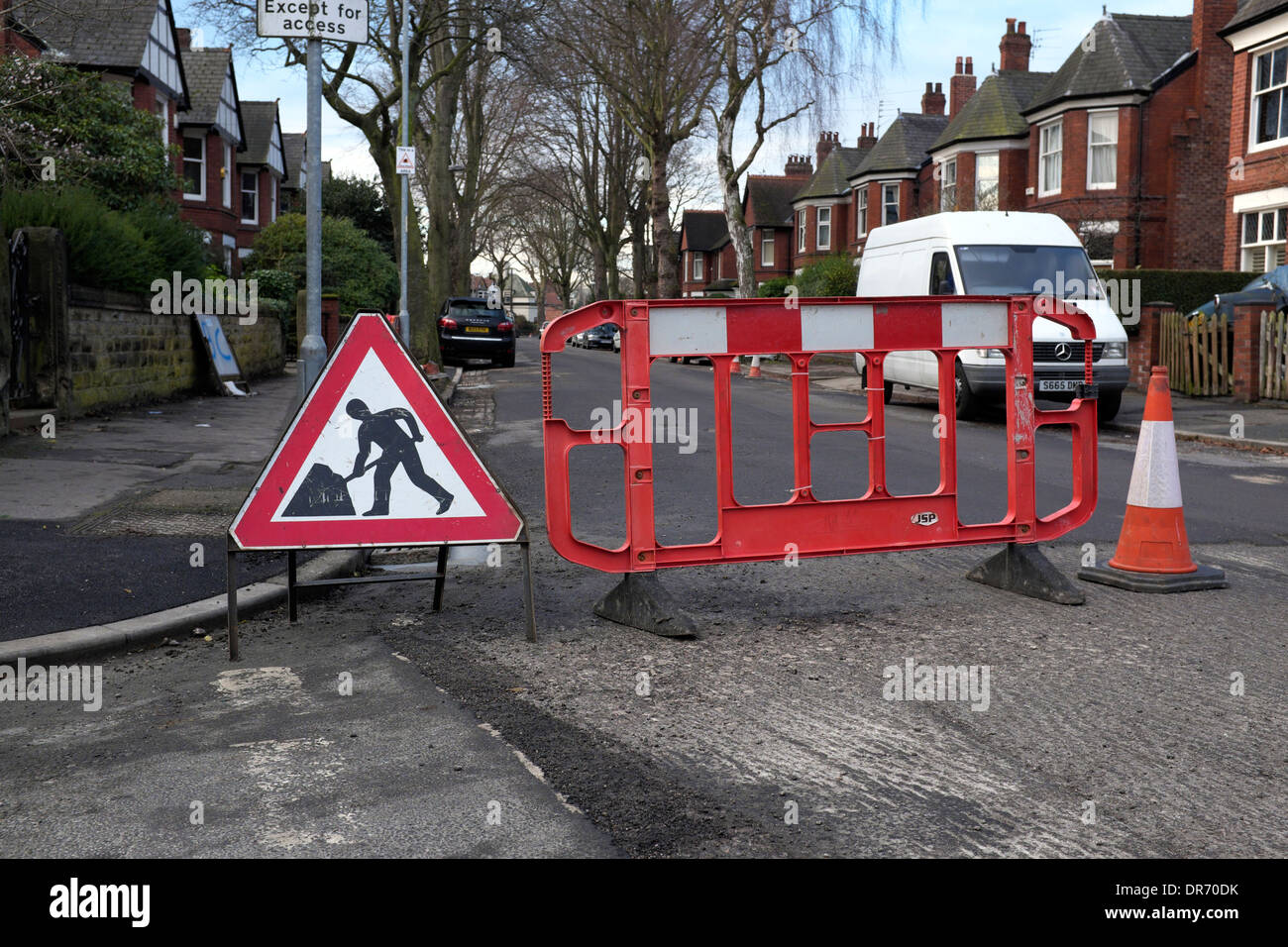 sign indicating roadworks on a suburban street Stock Photo - Alamy