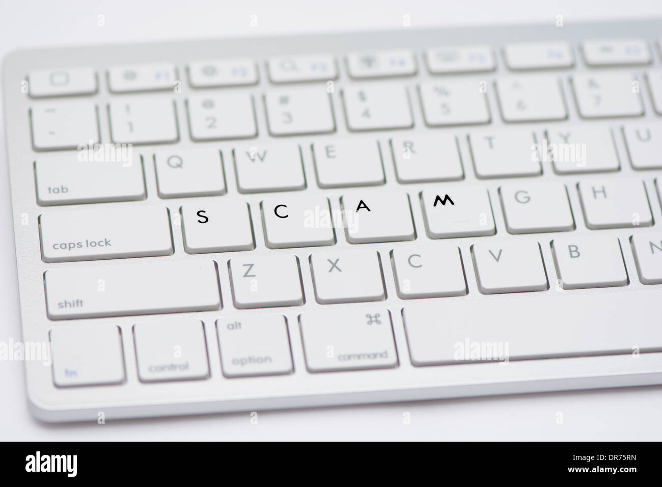 Computer Keyboard With Letters Spelling Out The Work Scam And Dislike ...