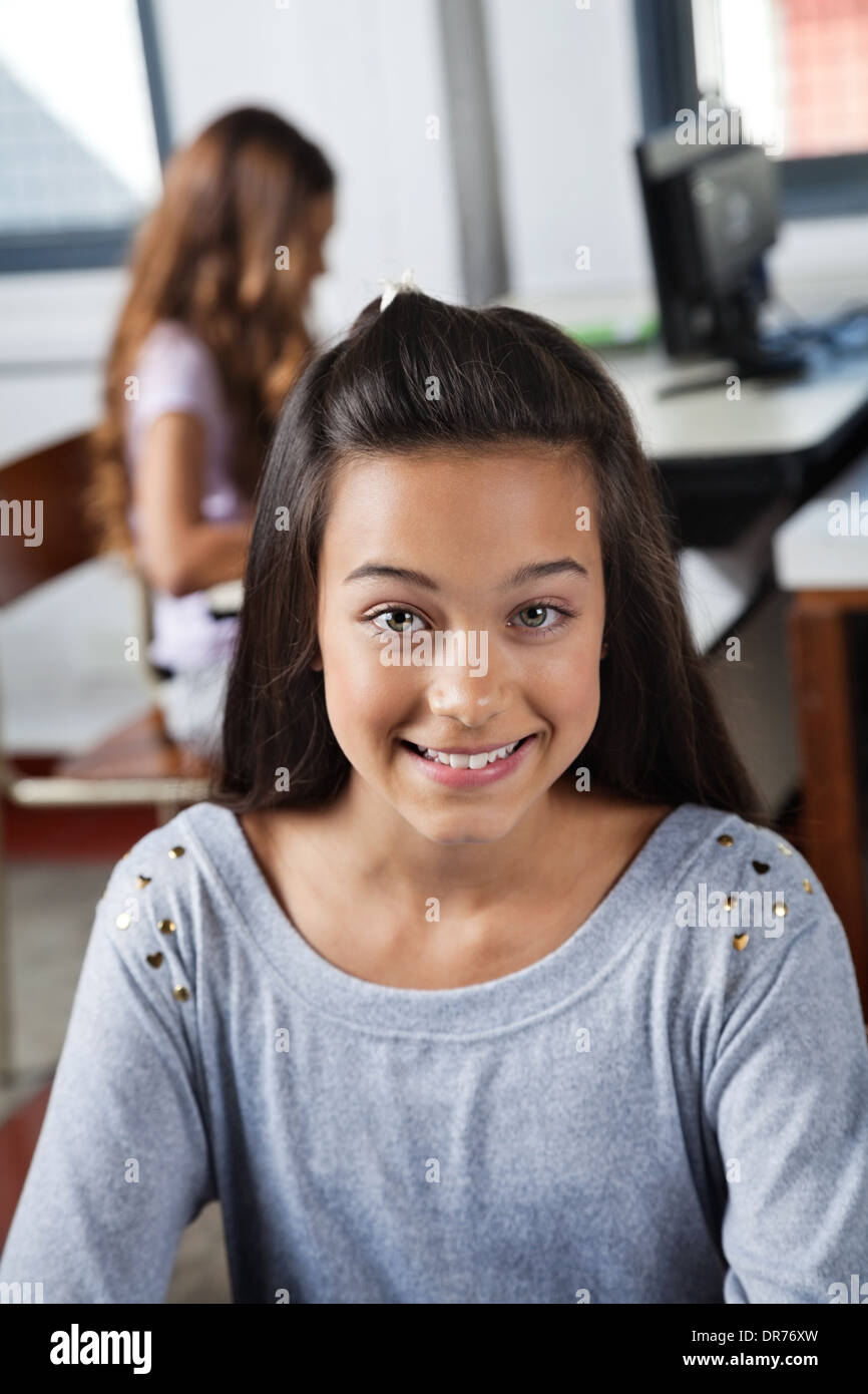 Female Student Smiling In Computer Class Stock Photo - Alamy