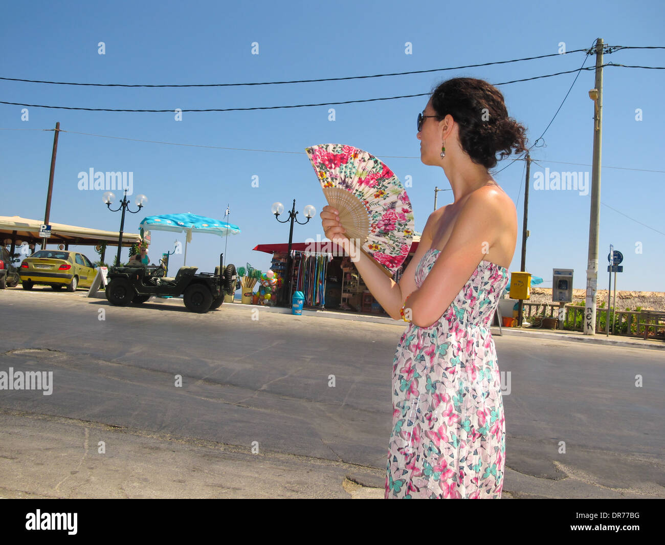Handfan for summer hi-res stock photography and images - Alamy