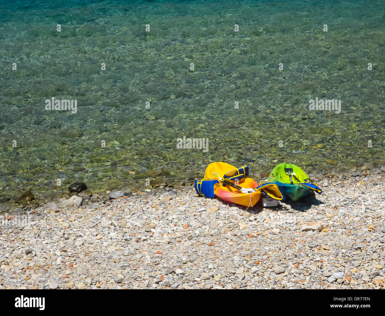 Two canoes laying on the shore in Crete Island, Greece Stock Photo - Alamy