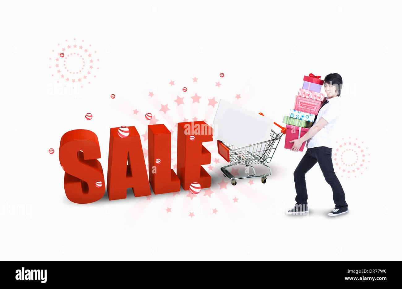 a girl holding pile of presents pushing shopping cart Stock Photo - Alamy