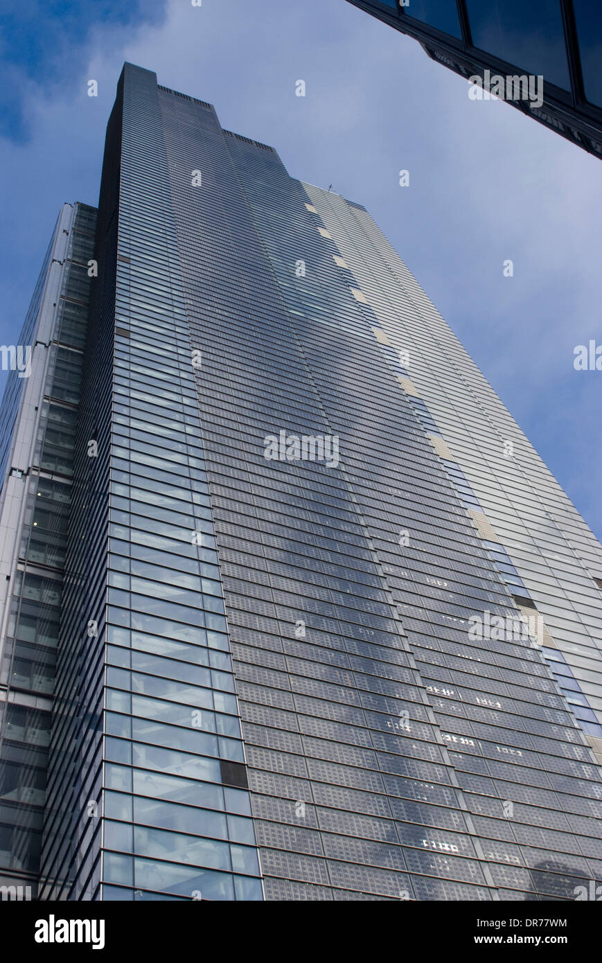 Looking up the glass facade of one of the City of London's high-rise ...