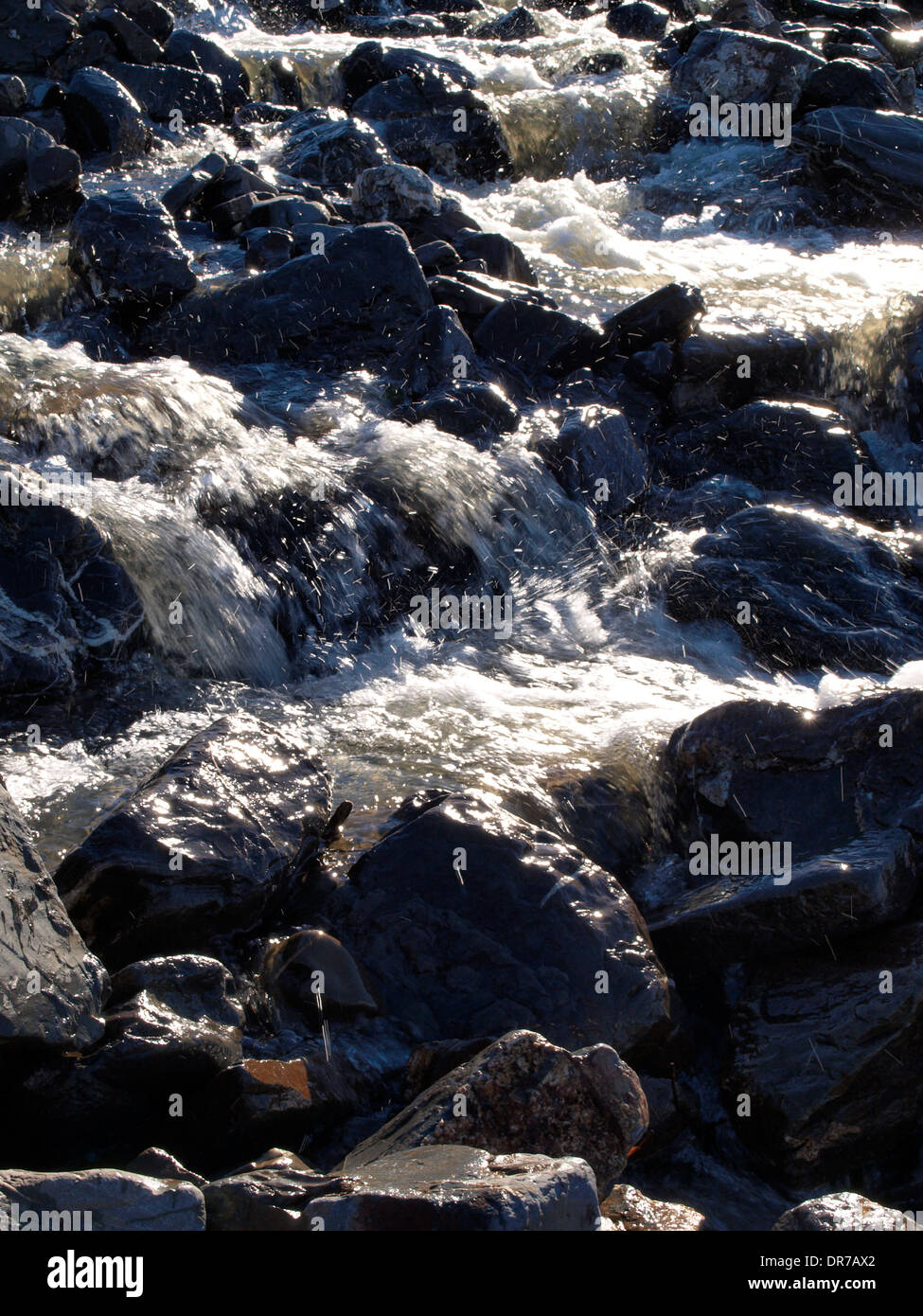 Water flowing over rocks in a river, Cornwall, UK Stock Photo - Alamy