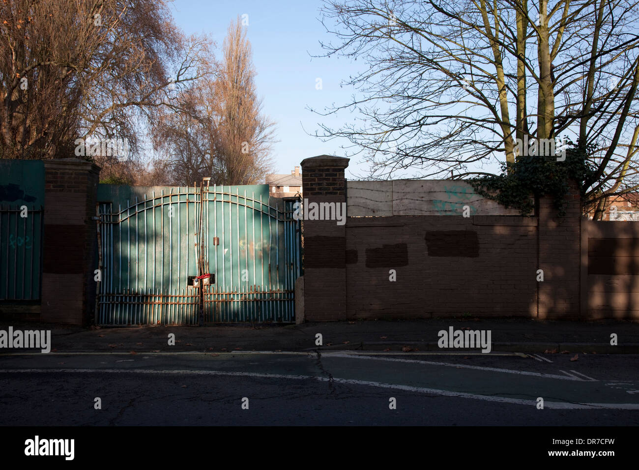 Boarded up fence gate Stock Photo - Alamy