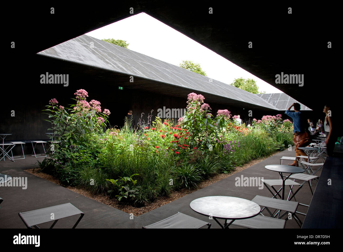 Serpentine Pavilion 2011, Hyde Park, London. Central flower border ...