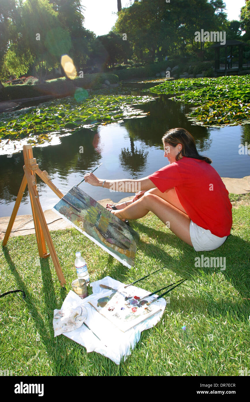 Woman paining outdoor hi-res stock photography and images - Alamy