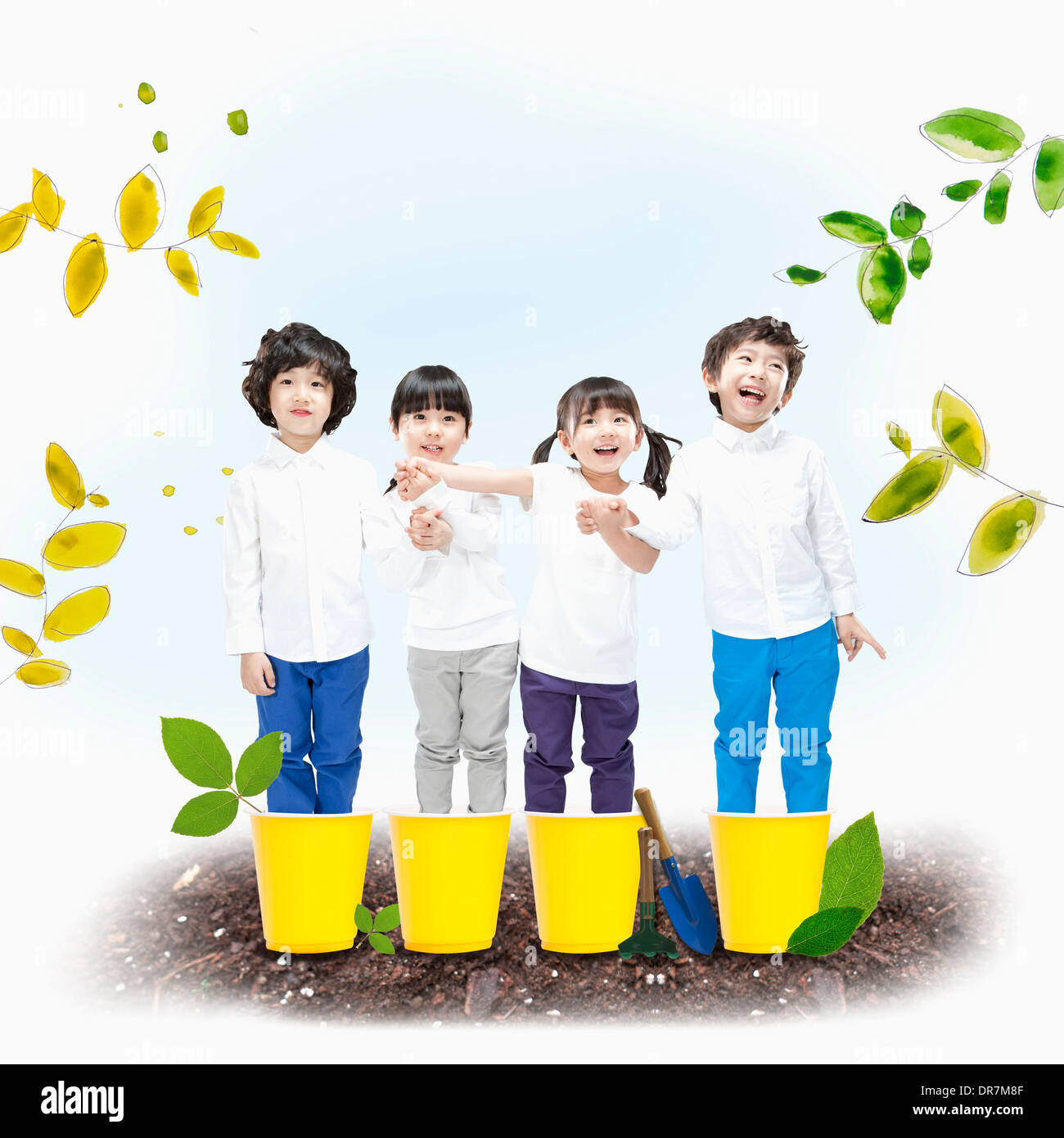 kids standing on yellow vases Stock Photo - Alamy