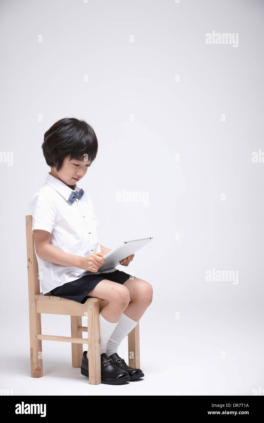 Boy using pc hi-res stock photography and images - Alamy