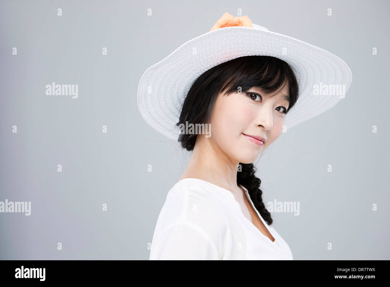 Woman in white hat hi-res stock photography and images - Alamy