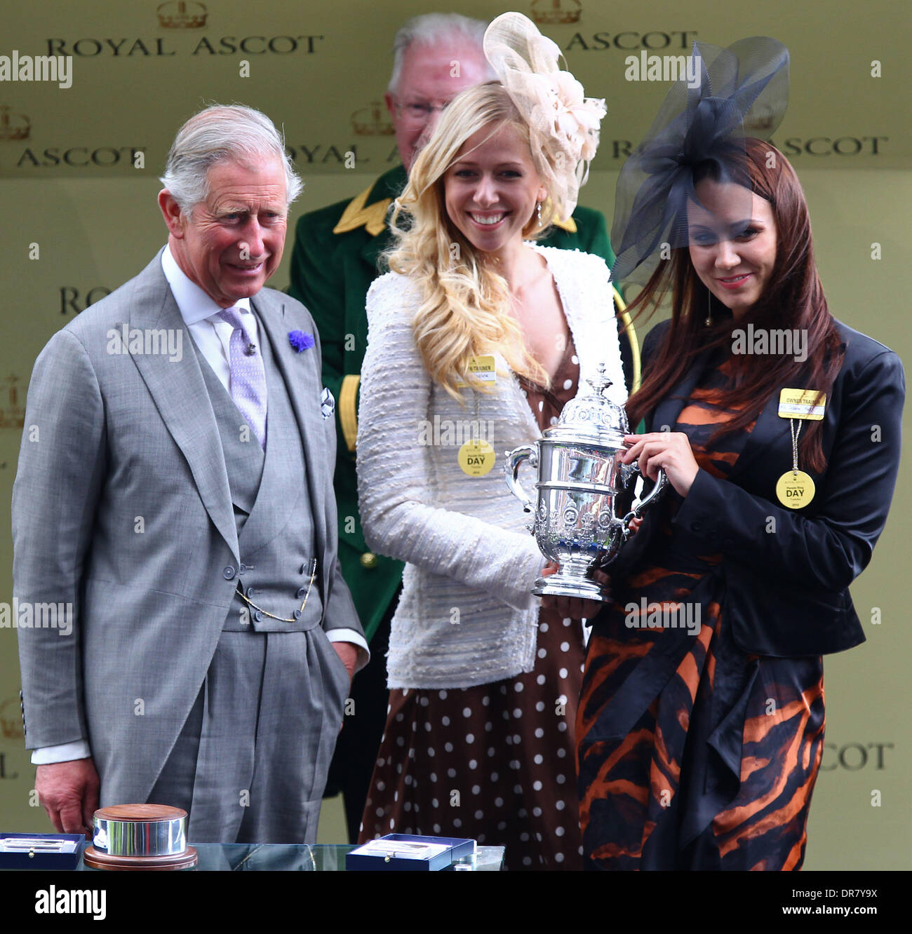 Prince Charles presents a trophy to the winning team of the St. James ...