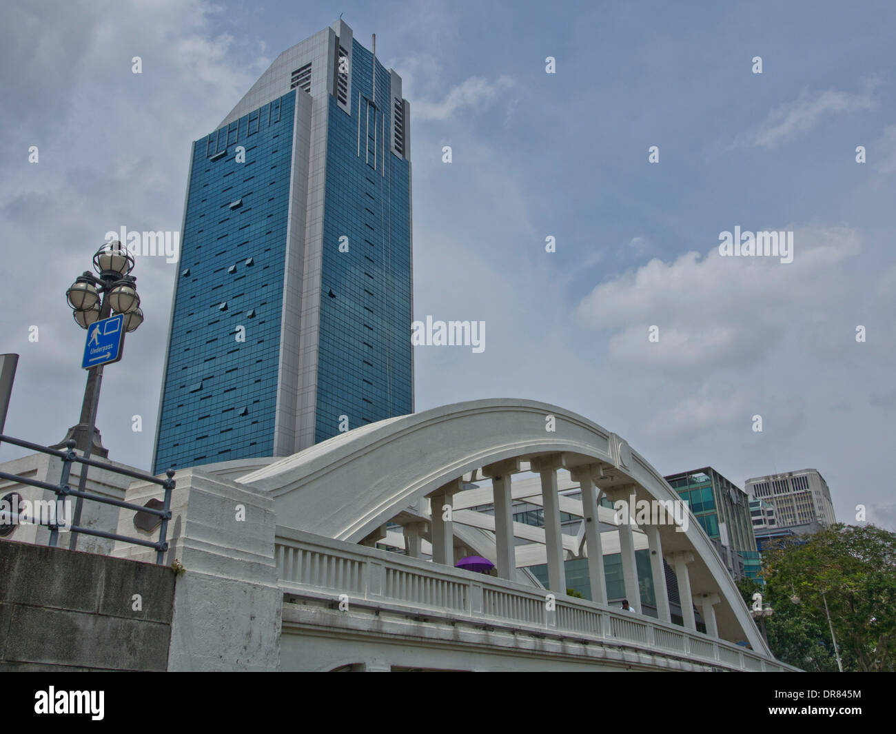The 1920s Elgin Bridge by the river in Singapore with financial ...