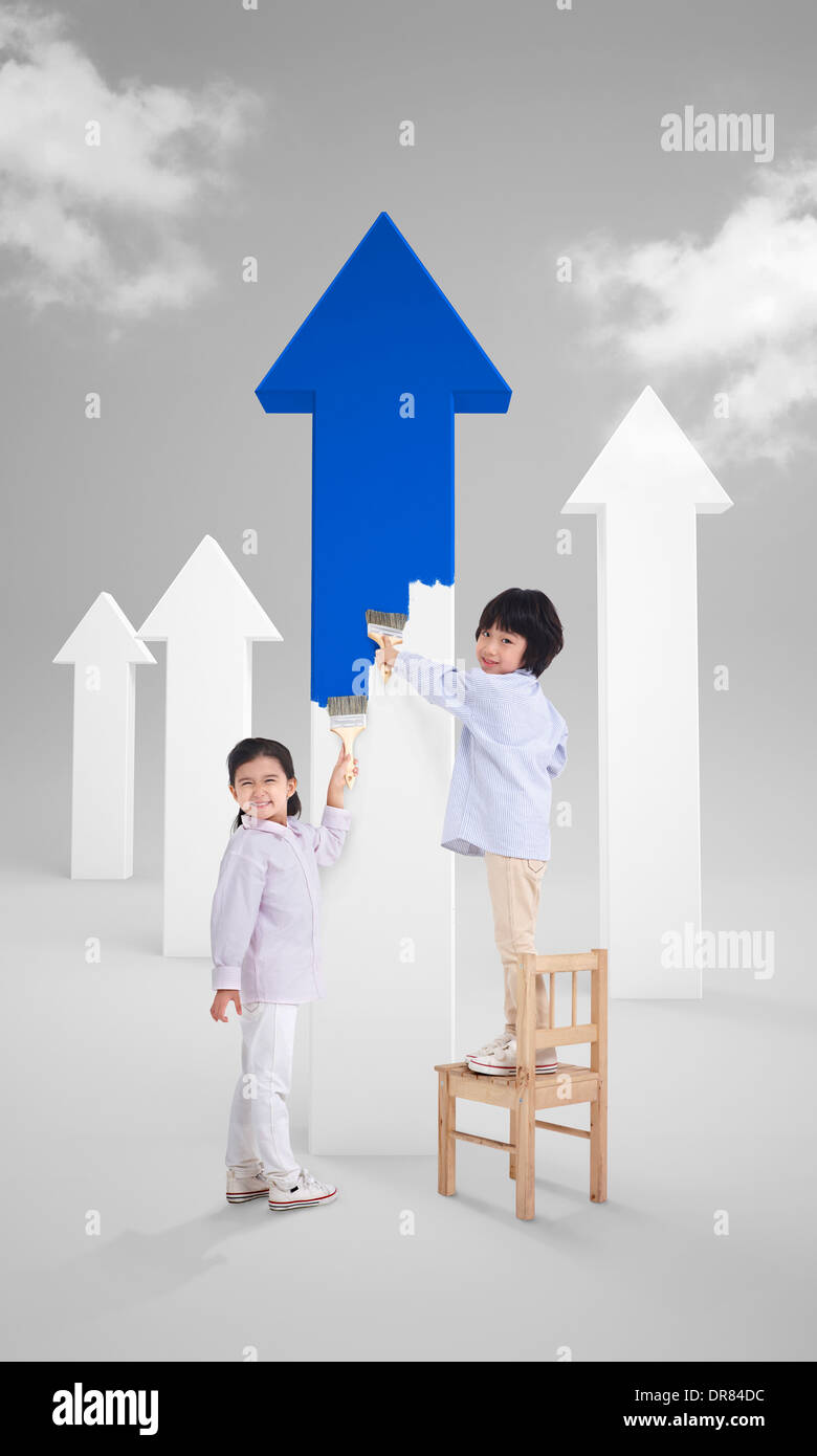 kids painting arrow Stock Photo - Alamy