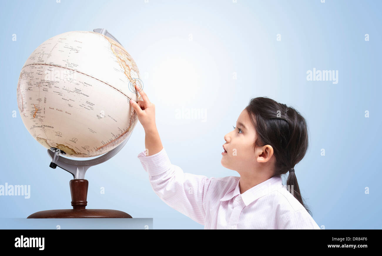 Person looking at world globe hi-res stock photography and images - Alamy