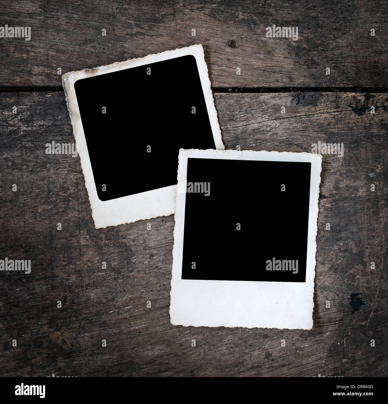 two, empty old photos frame on wooden wall Stock Photo - Alamy